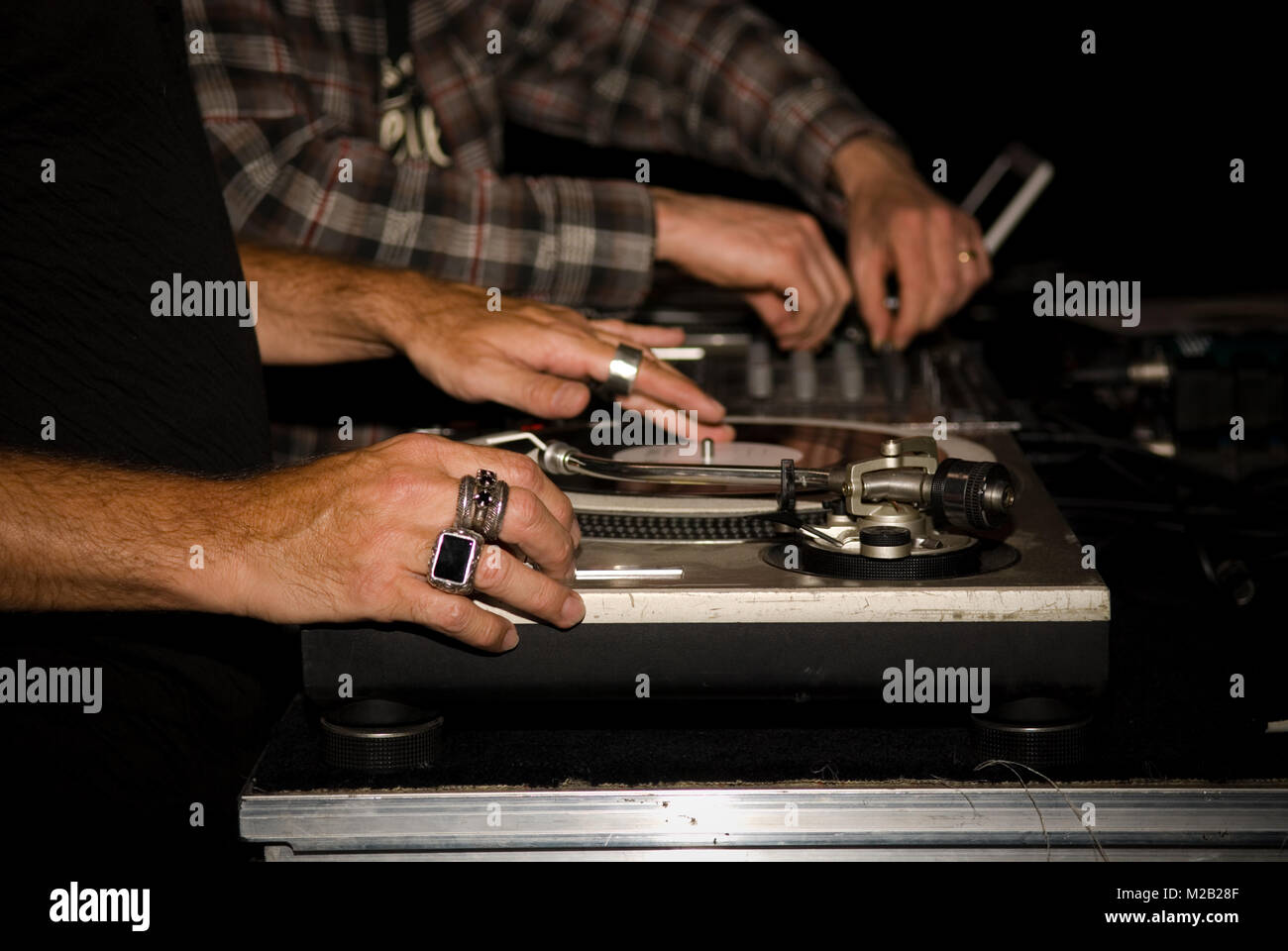 Dj spinning decks hi-res stock photography and images - Alamy