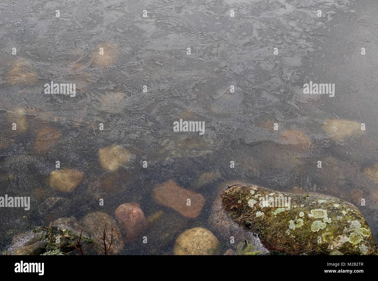 Rocks at the Edge of the Frozen Surface of Loch Kinord, Muir of Dinnet ...