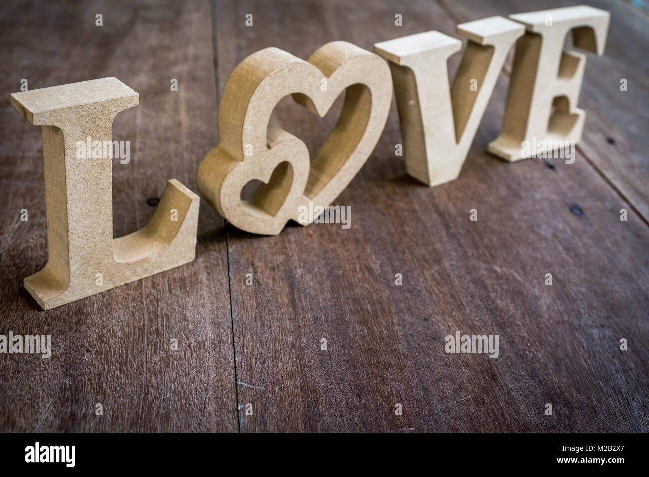 Love letter made from wood on the old wooden floor Stock Photo - Alamy