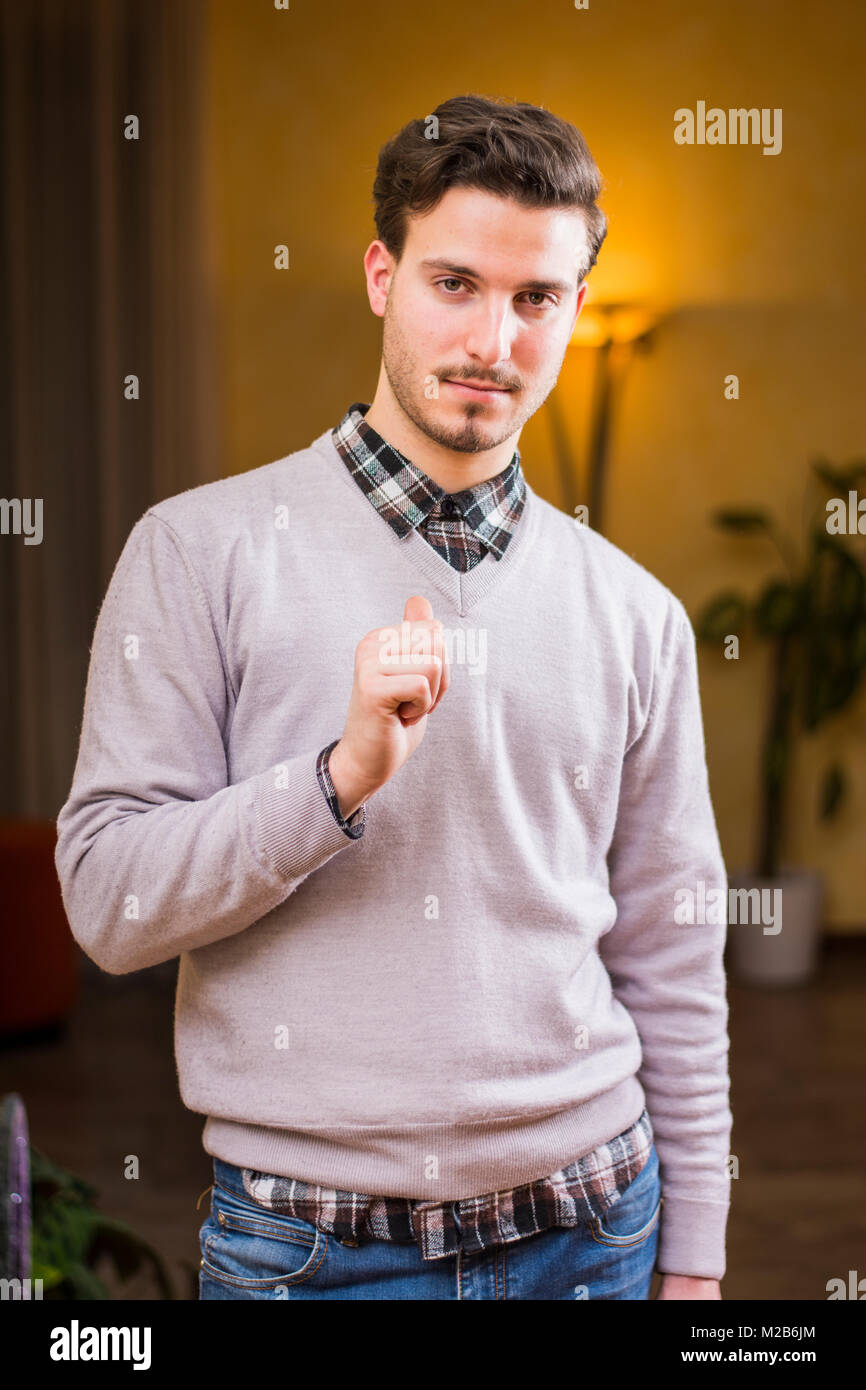 Handsome man point finger hi-res stock photography and images - Alamy