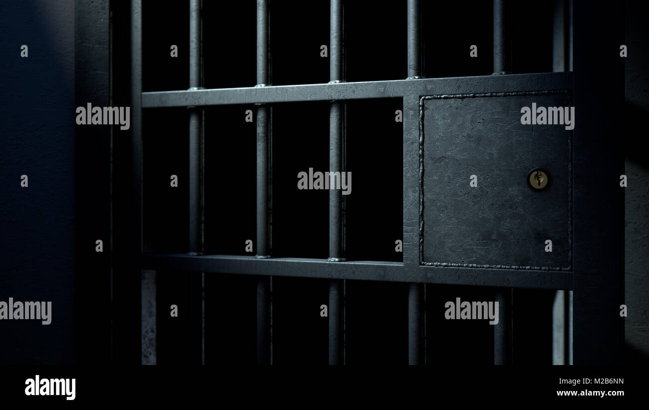 A closeup of the locking mechanism of an open jail cell with welded ...