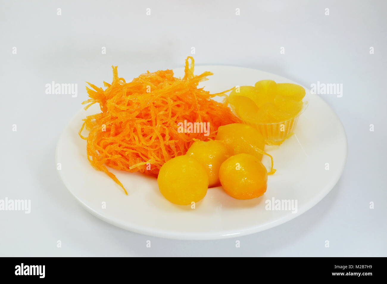 egg yolk golden thread and egg yolk golden drop Stock Photo - Alamy