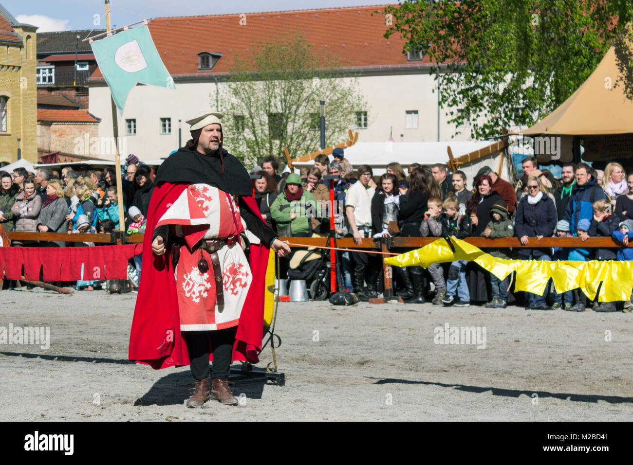 Actor playing a judge during a trial in a medieval fair in Germany with ...