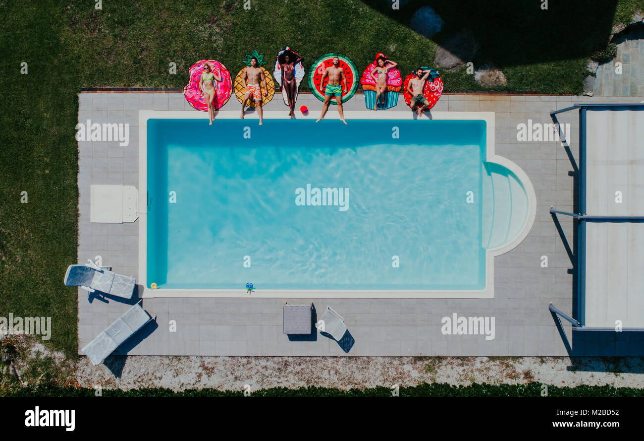 group of friends having fun in the swimming pool Stock Photo - Alamy