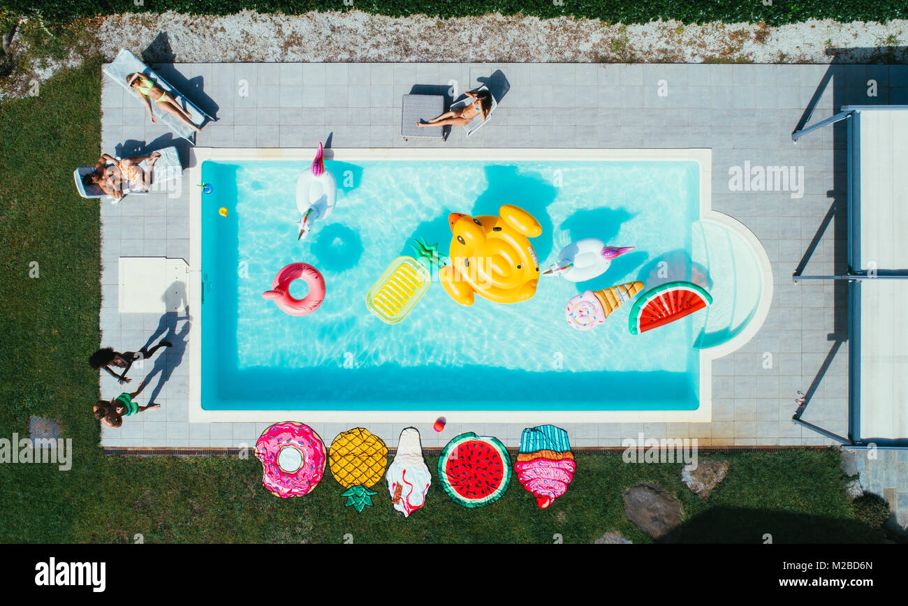 group of friends having fun in the swimming pool Stock Photo - Alamy