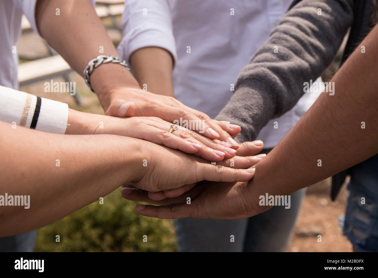 business team work, Stack of hands Stock Photo - Alamy