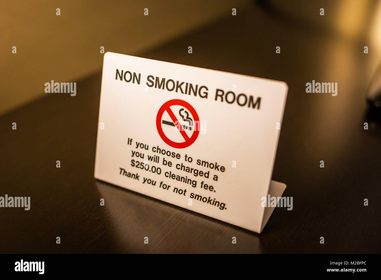 No smoking room sign warning with fee info Stock Photo - Alamy