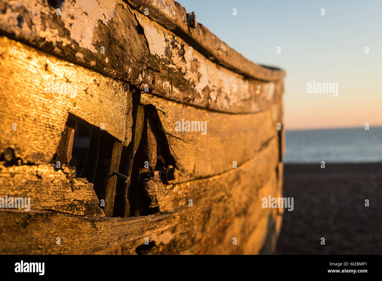 Close up of an old boat on Brighton Beach at Sunset in the winter Stock ...
