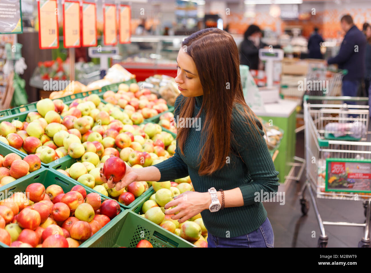 Beautiful woman buying fresh fruit and vegetables healthy eating hi-res ...