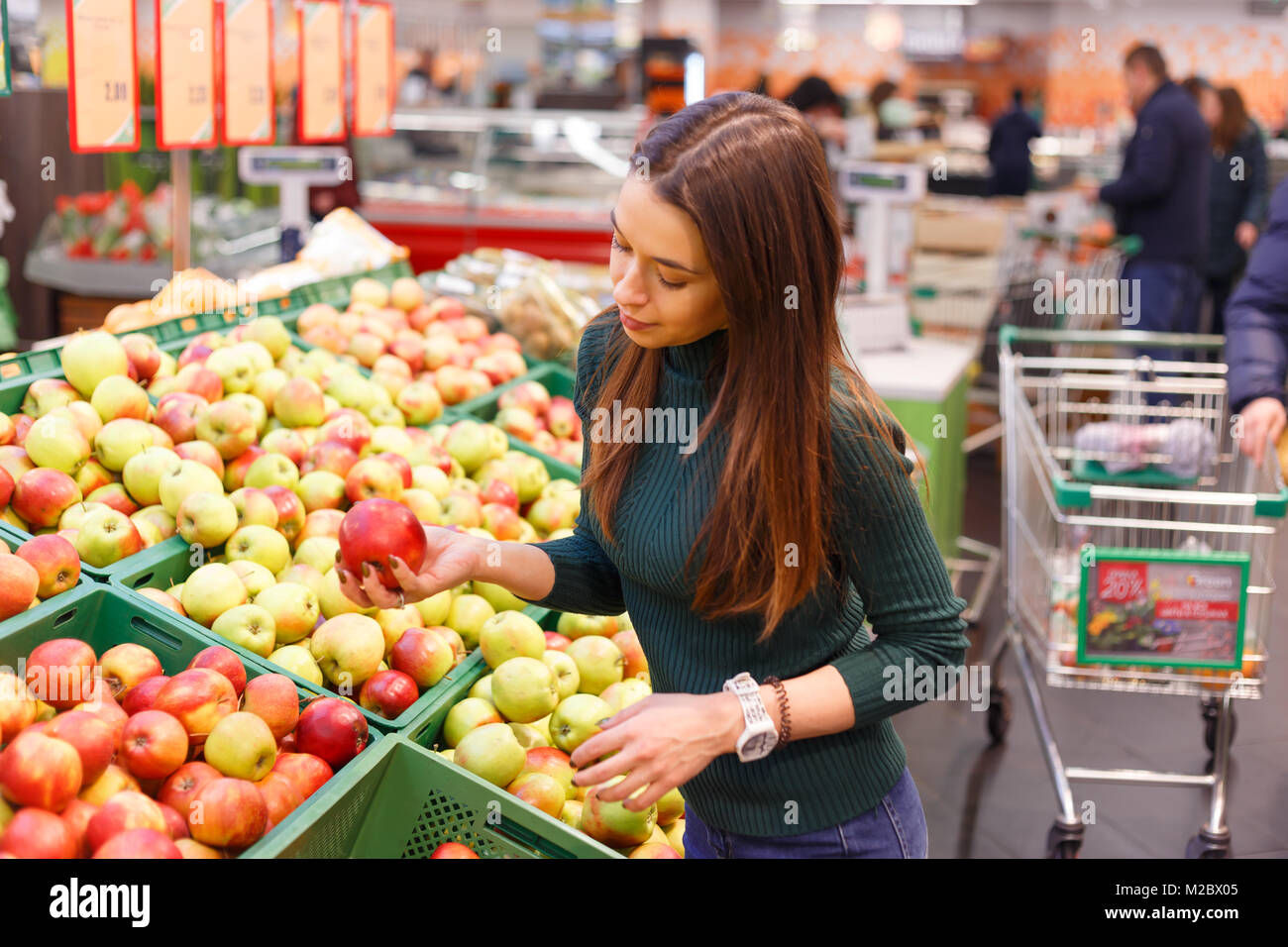Beautiful woman buying fresh fruit and vegetables healthy eating hi-res ...