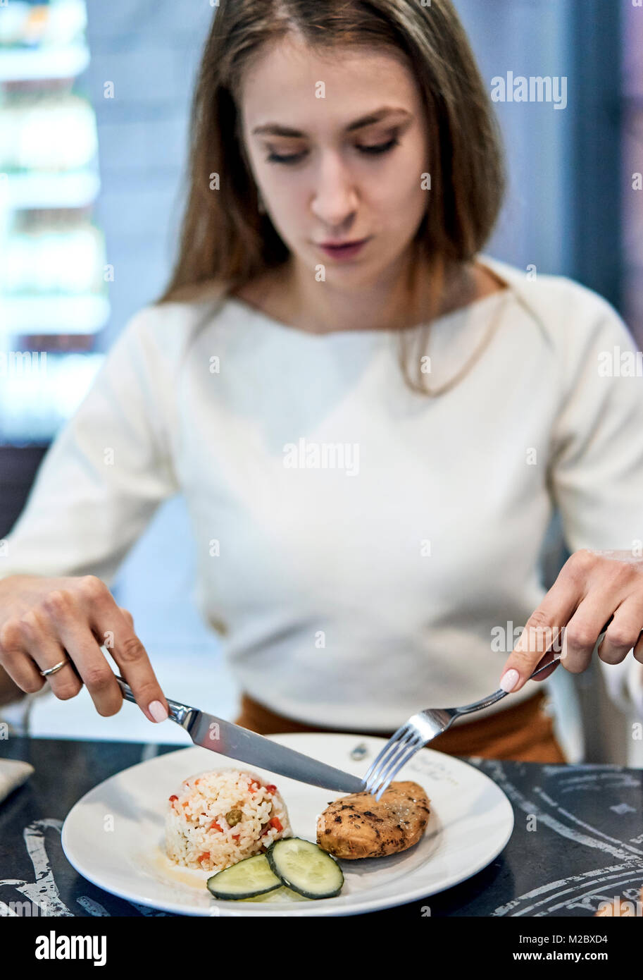 Meal food fork girl health interior hi-res stock photography and images ...