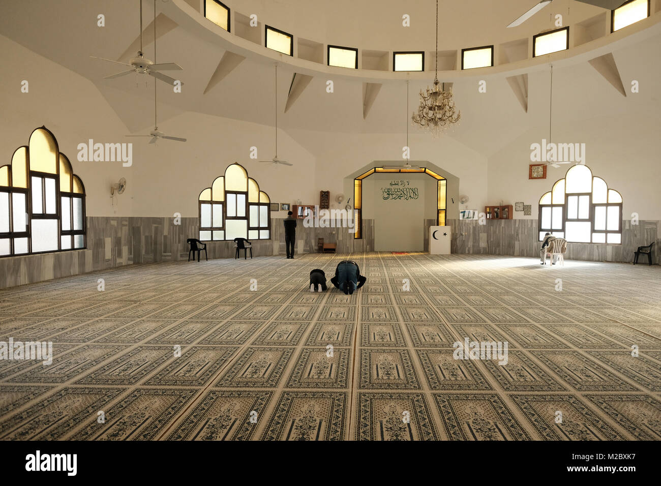 Members of the Ahmadiyya Muslim Community in Israel pray at Mahmood ...