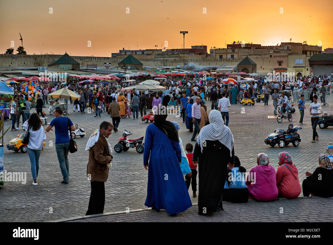 people on Lahdim Square at sunset, Meknes, Morocco, Africa Stock Photo ...