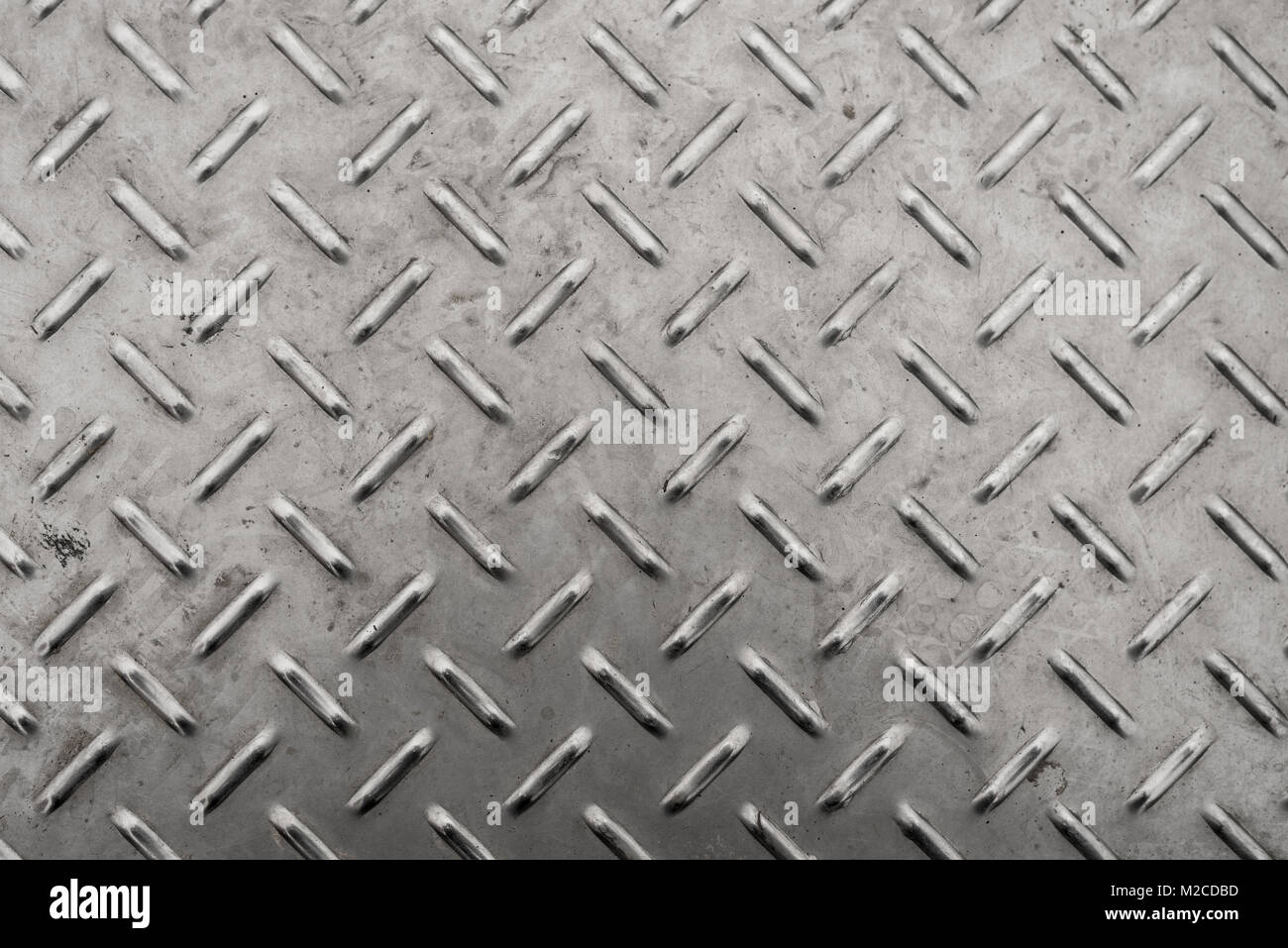 texture background of grungry old weathered metal diamond plate with ...