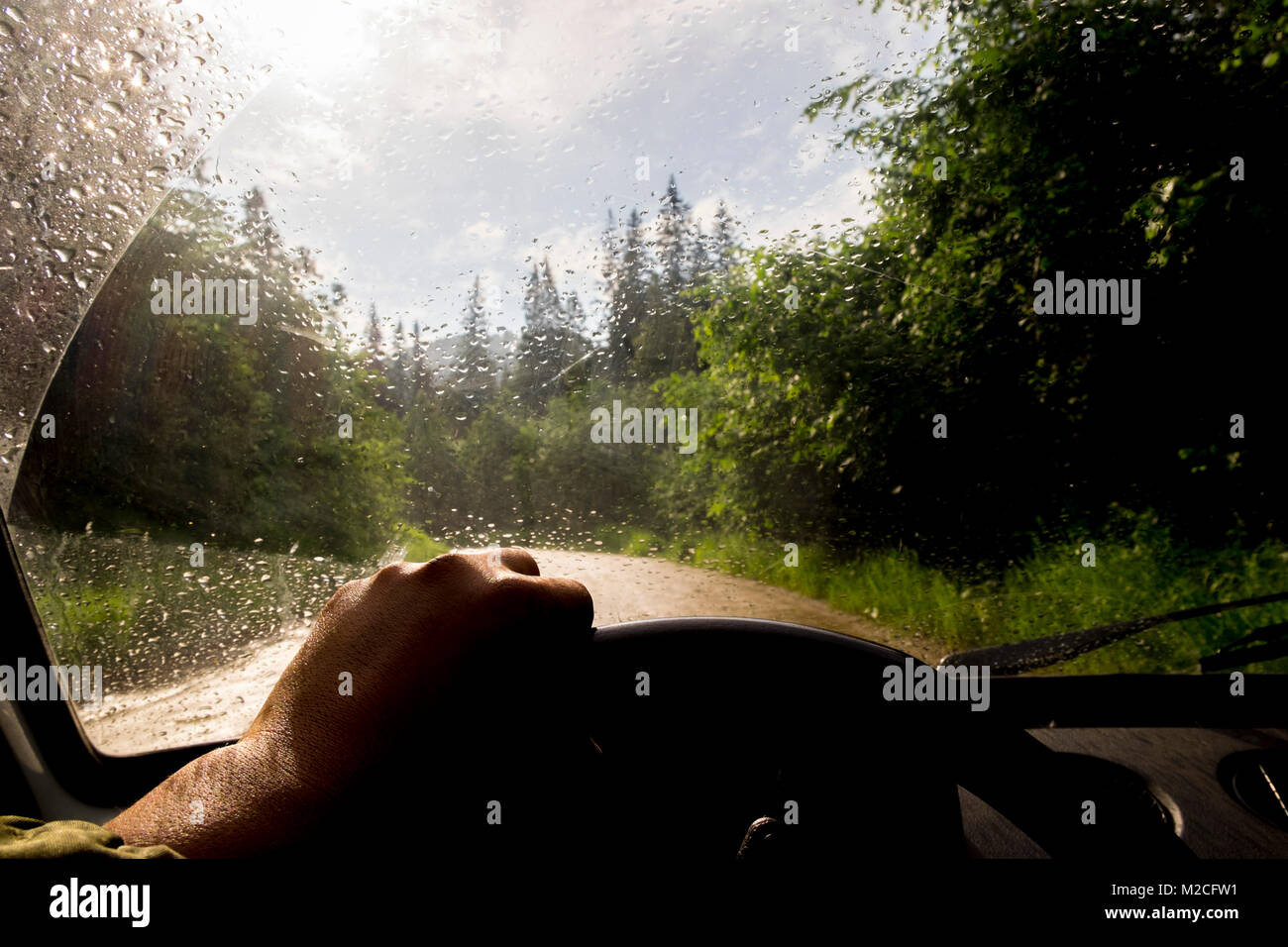Windshield of car driving in rain Stock Photo - Alamy