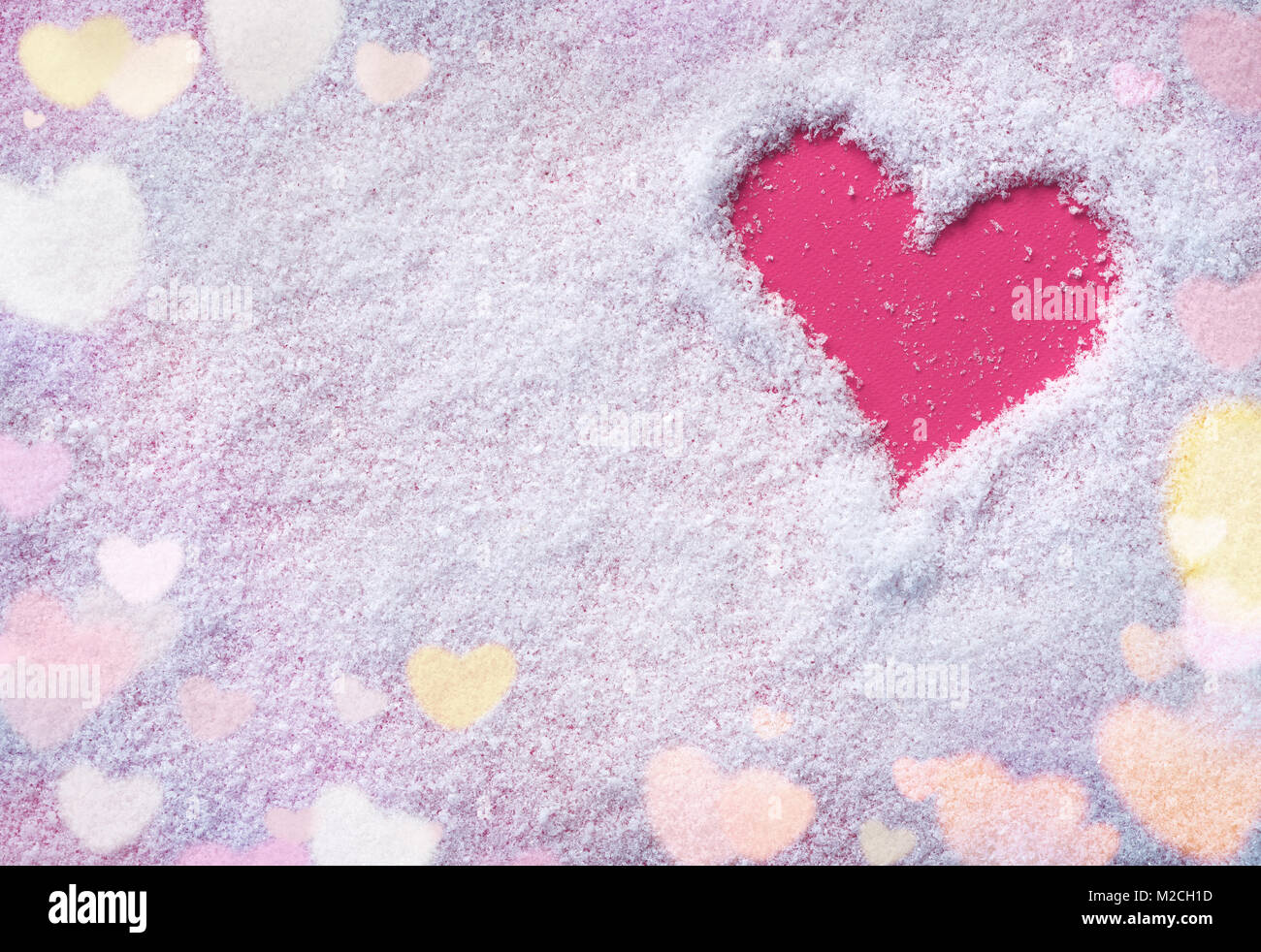 Snow background inside pink heart. Happy Valentines day Stock Photo - Alamy