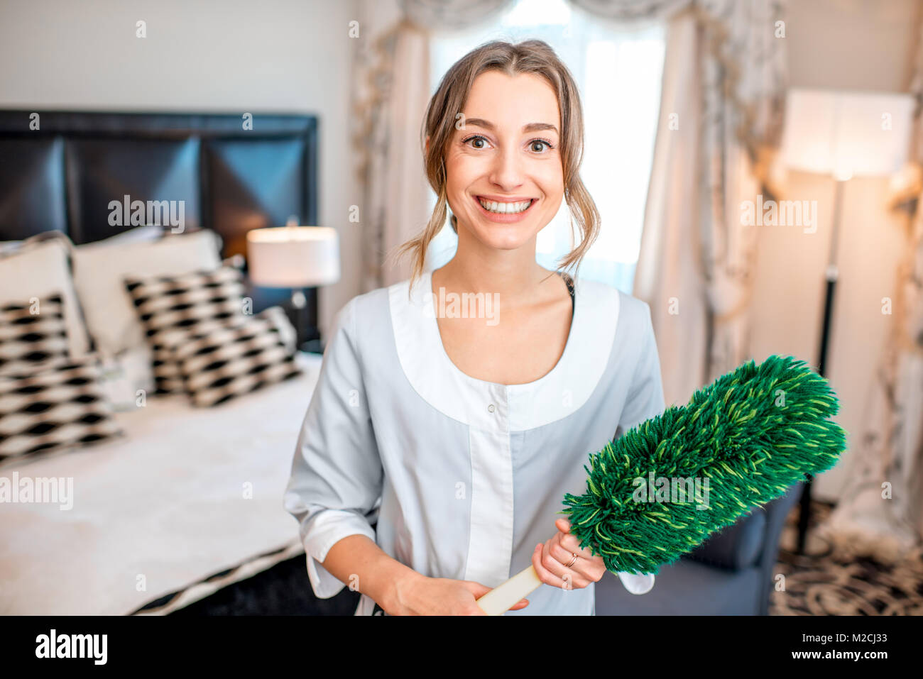 Chambermaid in the hotel room Stock Photo - Alamy