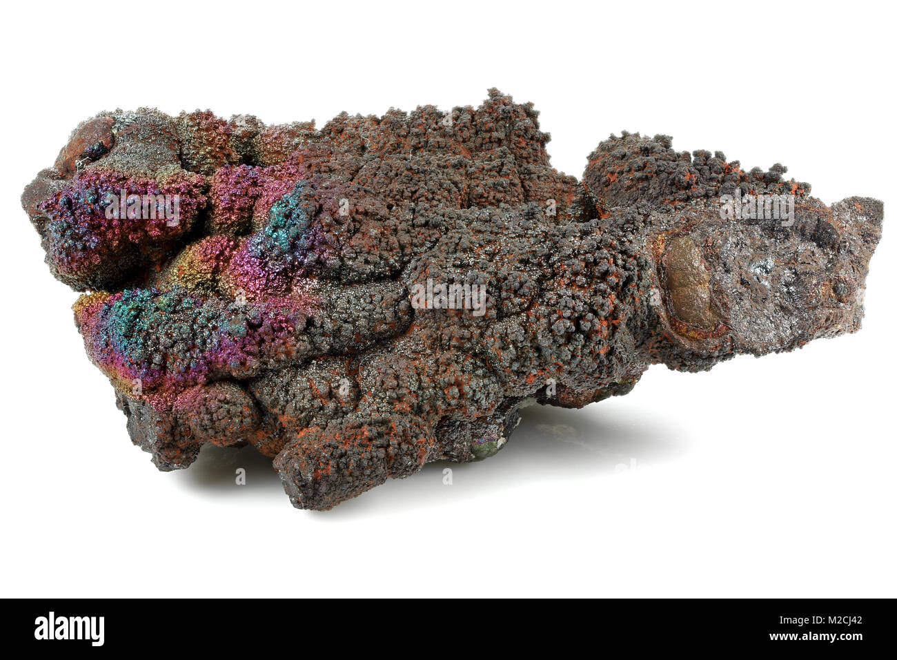 iridescent goethite from Tharsis/ Spain isolated on white background ...