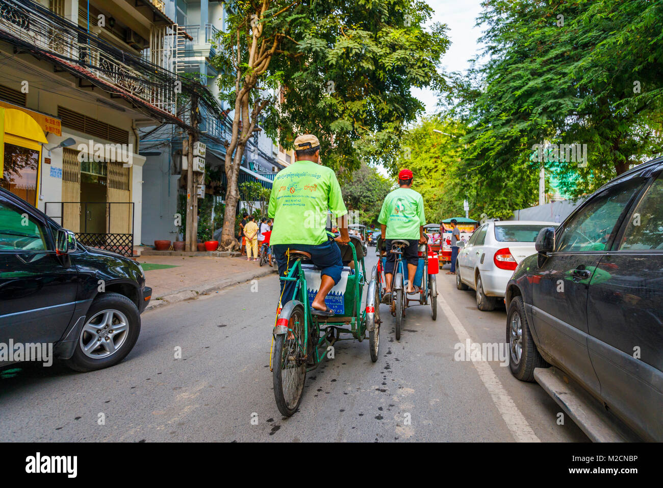Local cycle rickshaws on a tourist rickshaw city tour excursion in ...