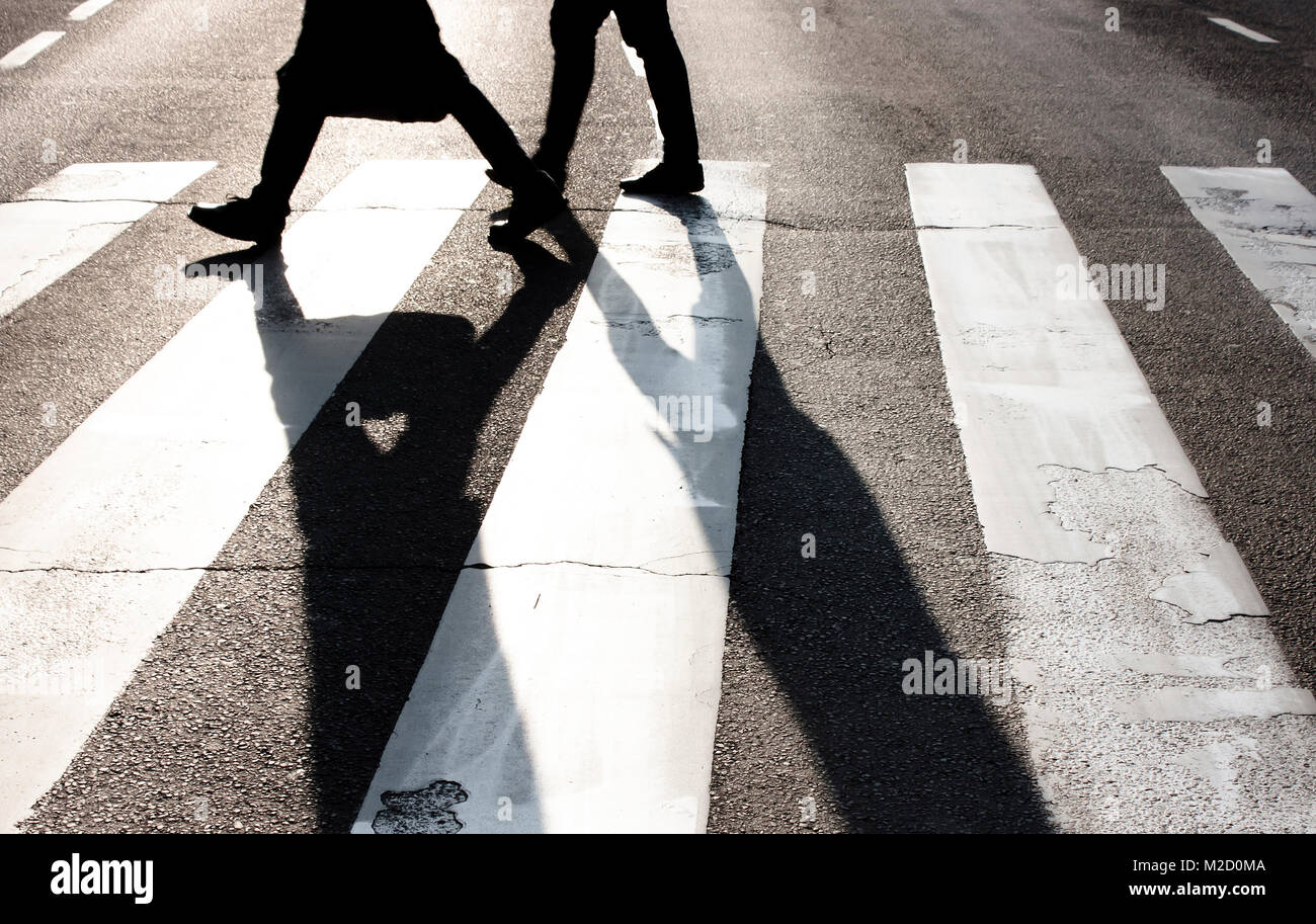 Man walking zebra crossing in hi-res stock photography and images - Alamy