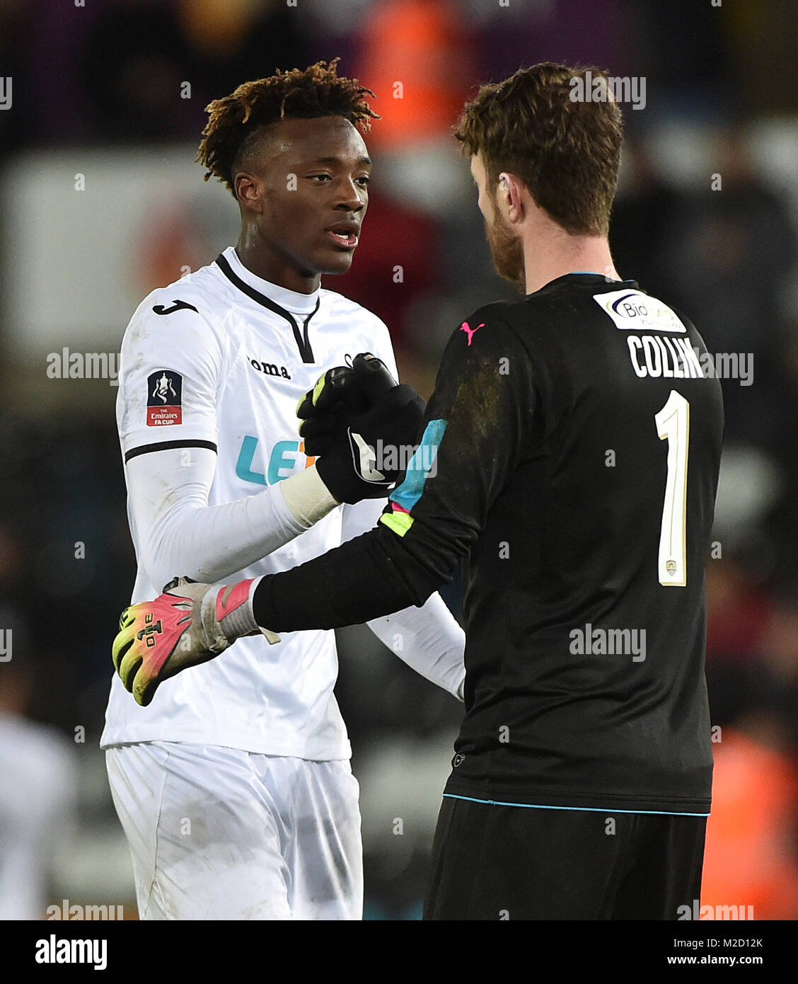 Swansea City's Tammy Abraham (left) shakes hands with Notts County ...