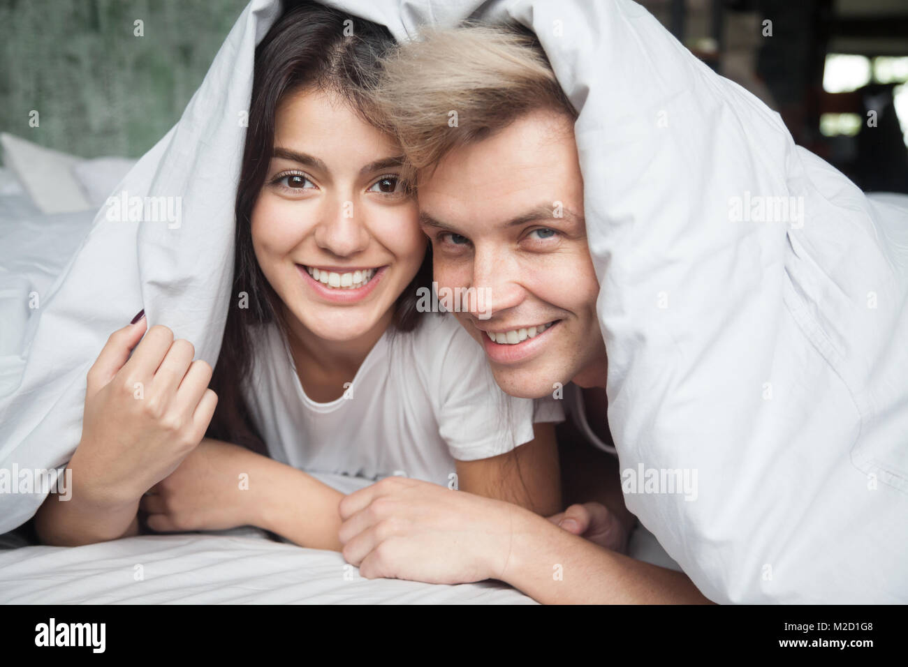 Lovers in bed hi-res stock photography and images - Alamy