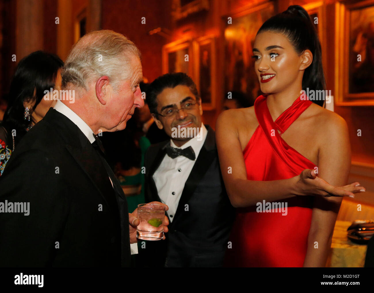 The Prince of Wales speaks to Neelam Gill at a reception and dinner ...