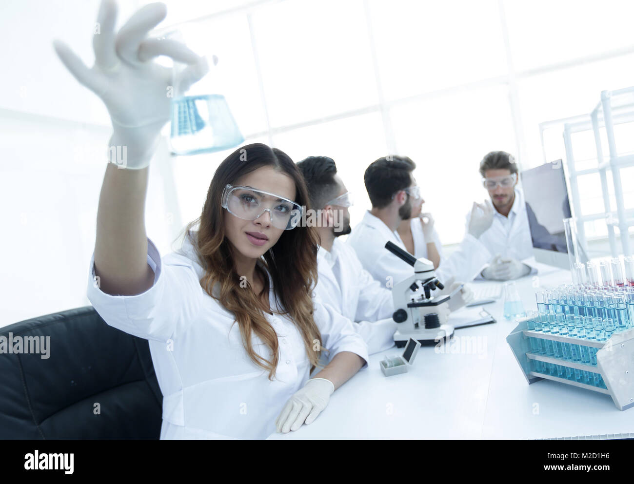group of creative scientists working in a laboratory Stock Photo - Alamy