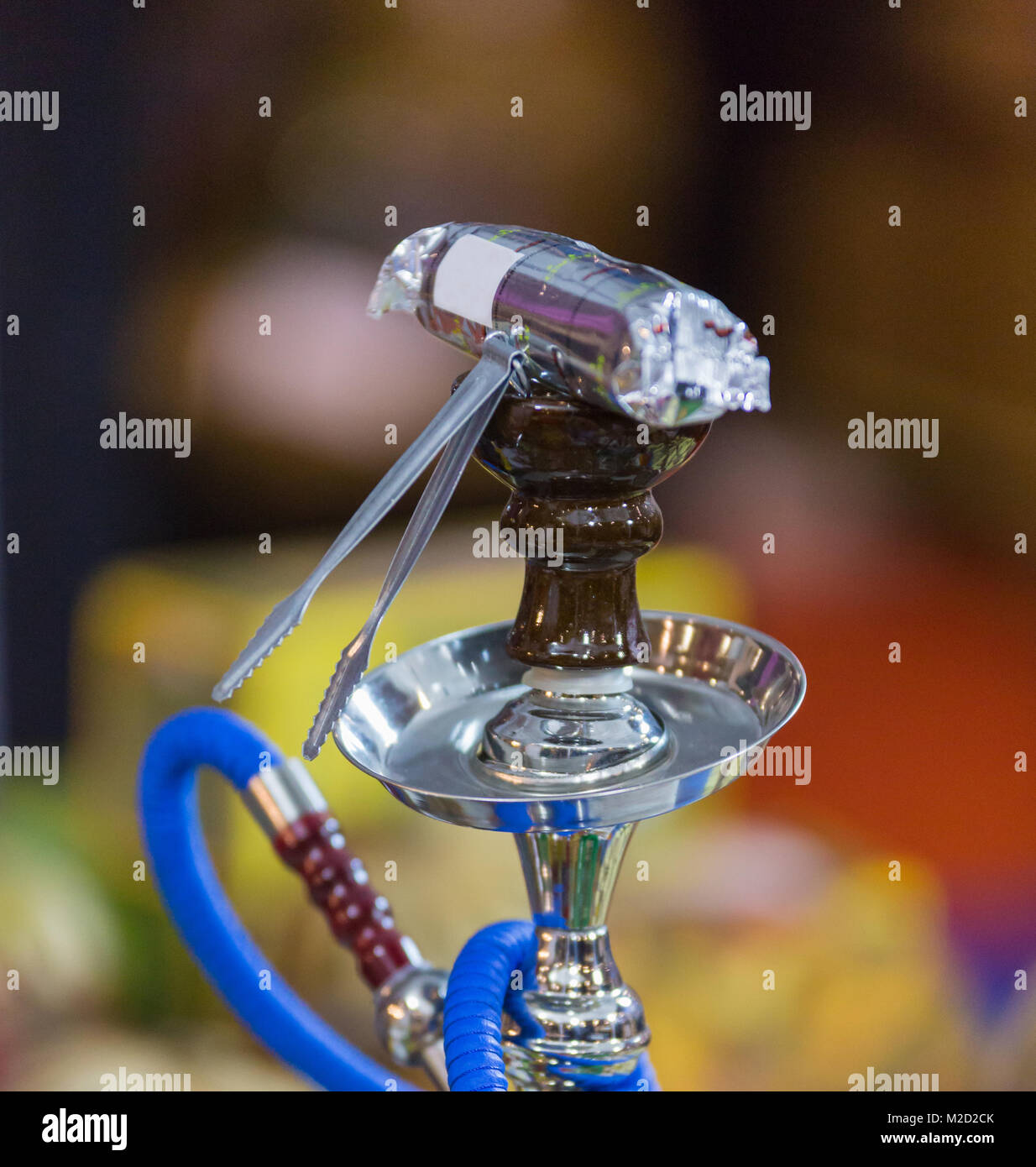 Small chrome plated hookah Stock Photo - Alamy