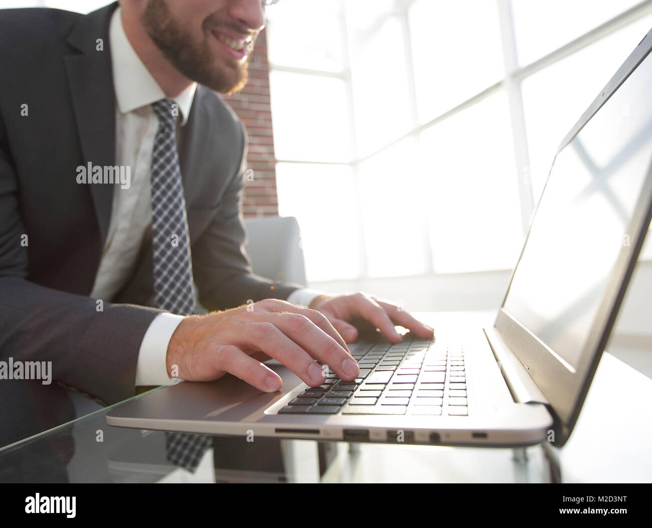Concentrated professional IT developer with laptop Stock Photo - Alamy