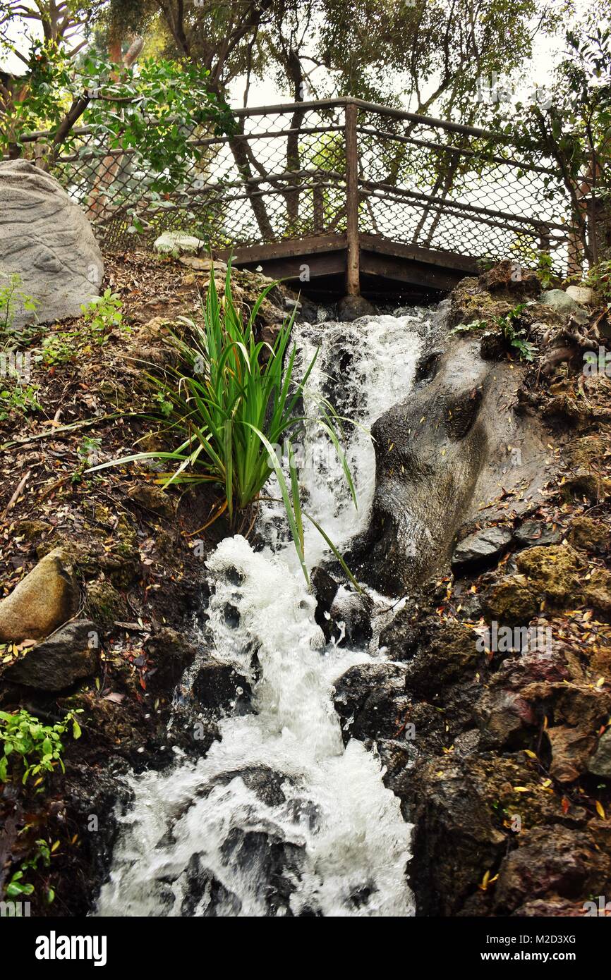 Waterfall With Small Bridge Over It At Pirates Lair, Disneyland ...