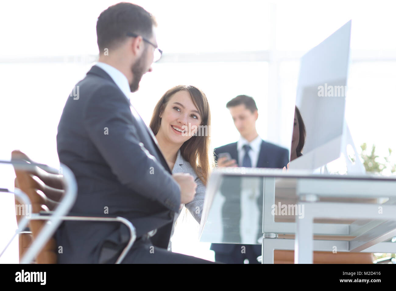 business colleagues talking in the office Stock Photo - Alamy