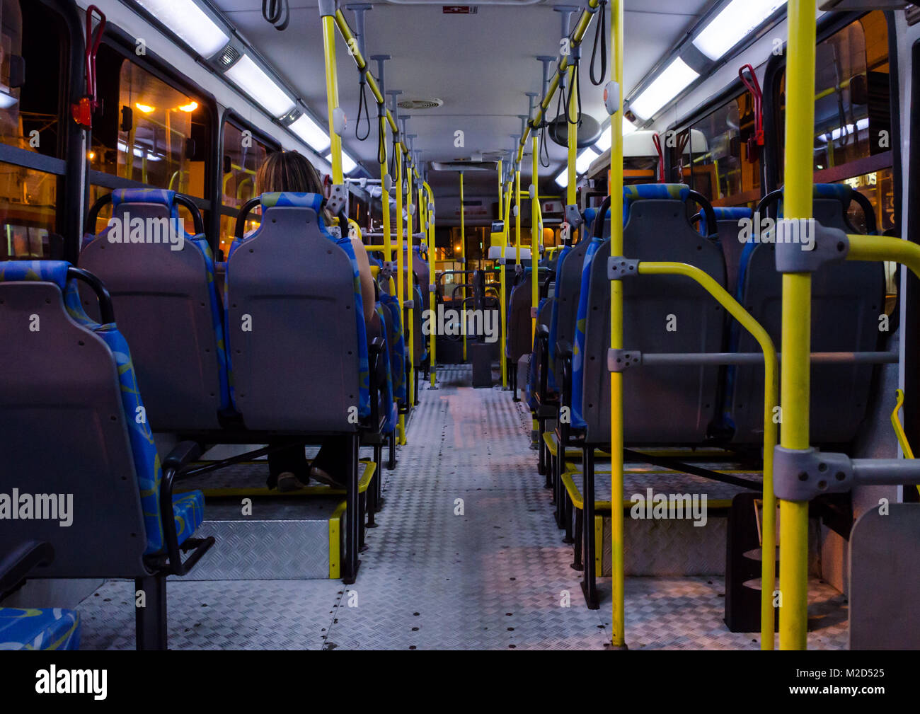 interior of an empty collective bus at night seen from the bottom ...