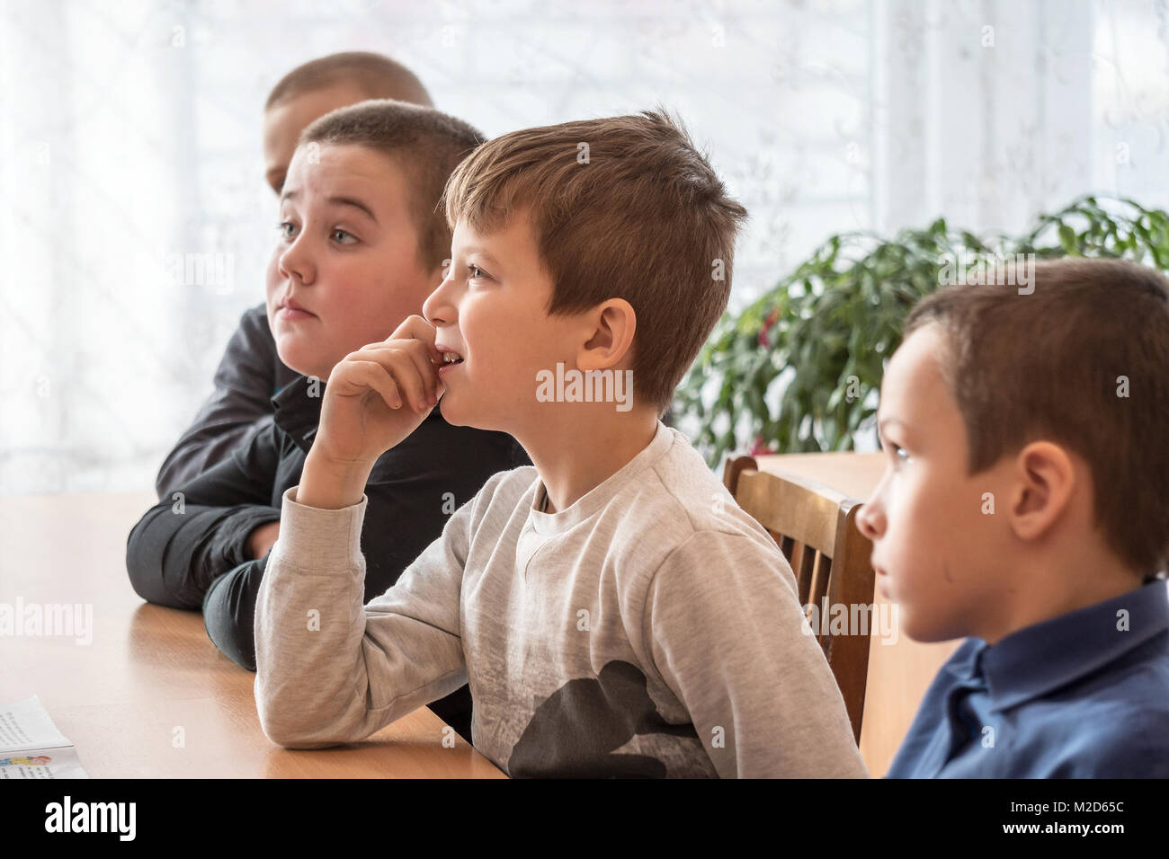 Young kids interacting classroom hi-res stock photography and images ...