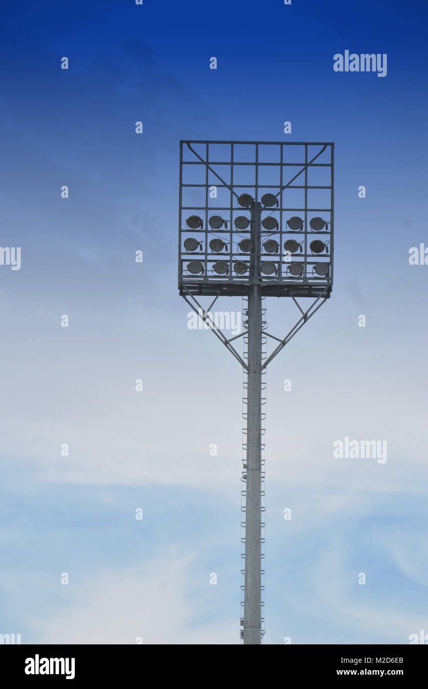 stadium light poles with white clouds and blue sky backgrounds Stock ...