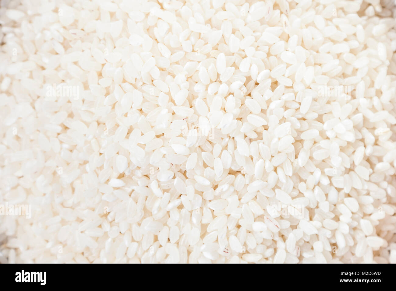 Close up uncooked raw rice hi-res stock photography and images - Alamy