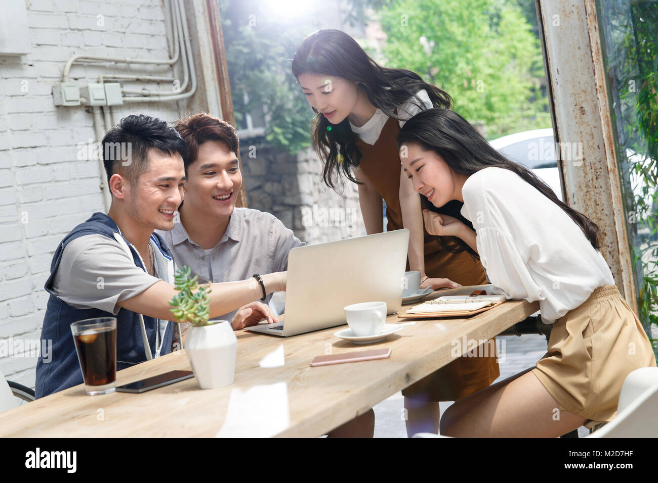 Young people work in a studio Stock Photo - Alamy