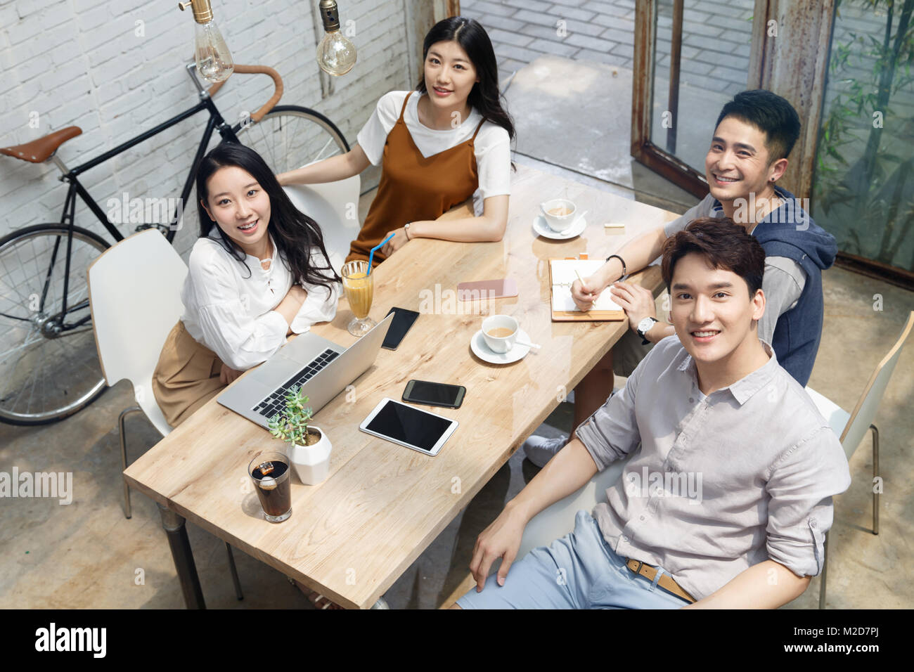 Young people work in a studio Stock Photo - Alamy