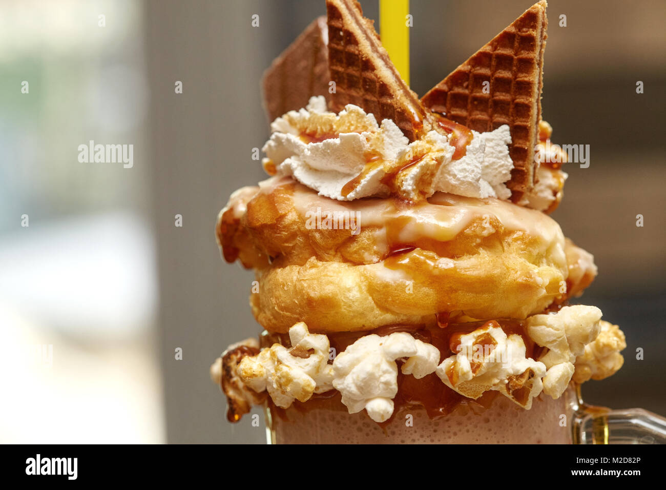 Caramel marshmallow candy milk shake cocktail with whipped cream ...