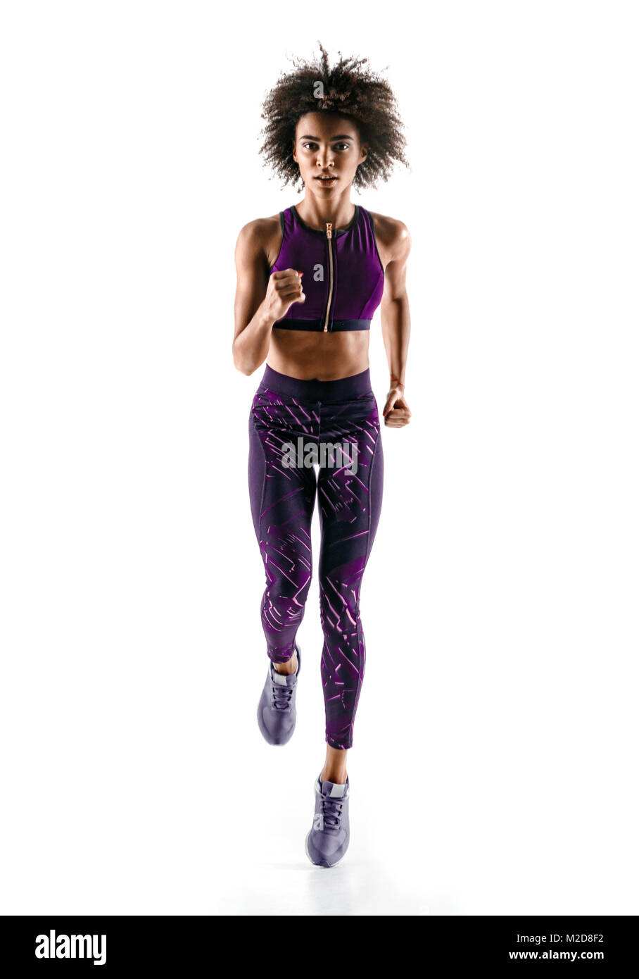 Young african girl runner in silhouette on white background. Dynamic ...