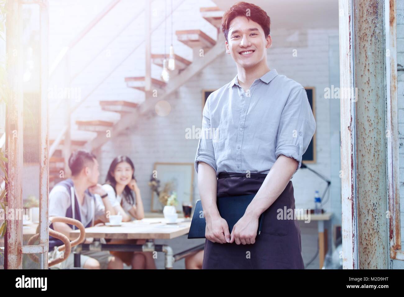 Restaurant attendant hi-res stock photography and images - Alamy
