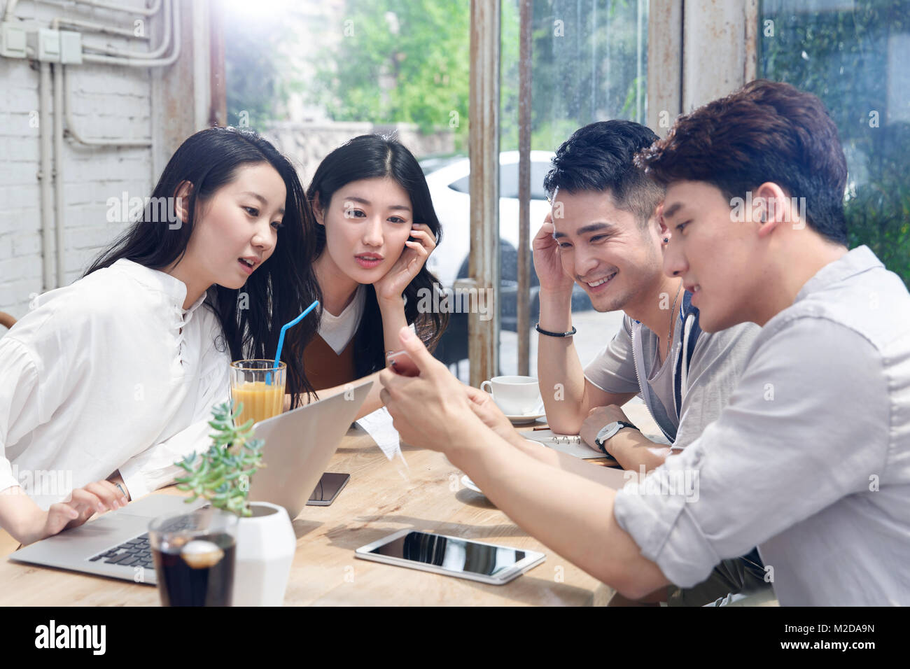 Young people work in a studio Stock Photo - Alamy