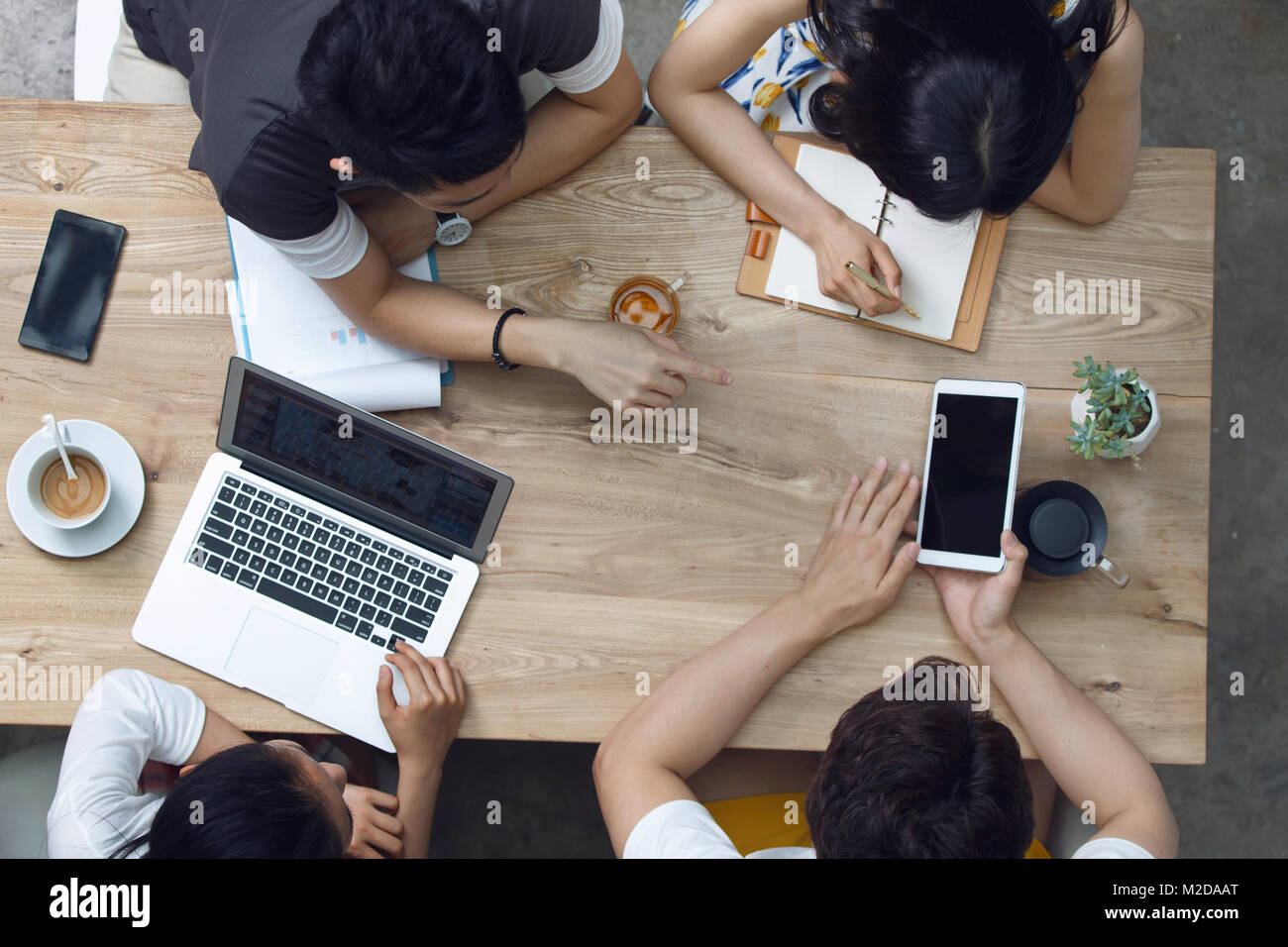 Young people work in a studio Stock Photo - Alamy