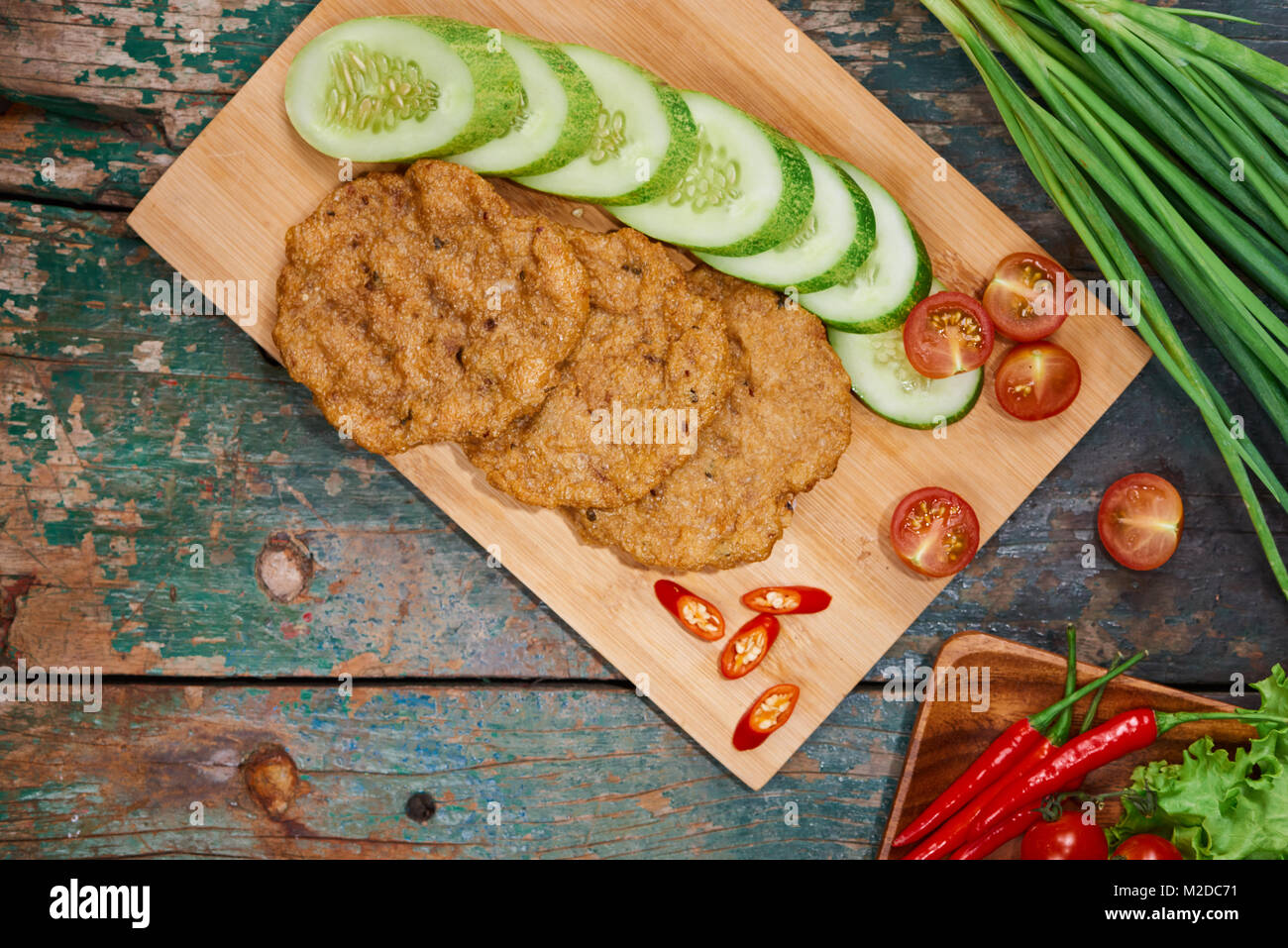 Vietnam fried fish patty with vegetable and sauce Stock Photo - Alamy