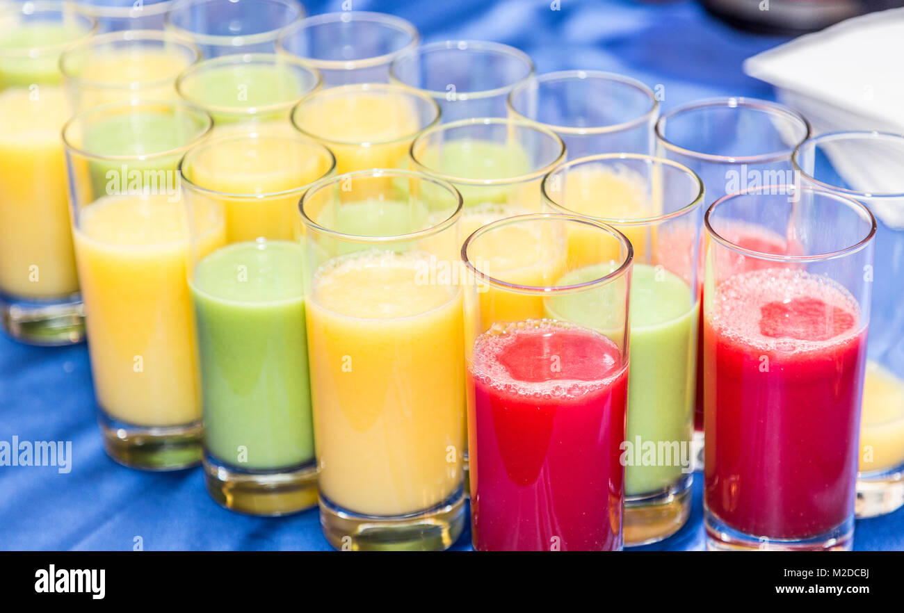 Colorful glasses of fruit juice. Close-up Stock Photo - Alamy
