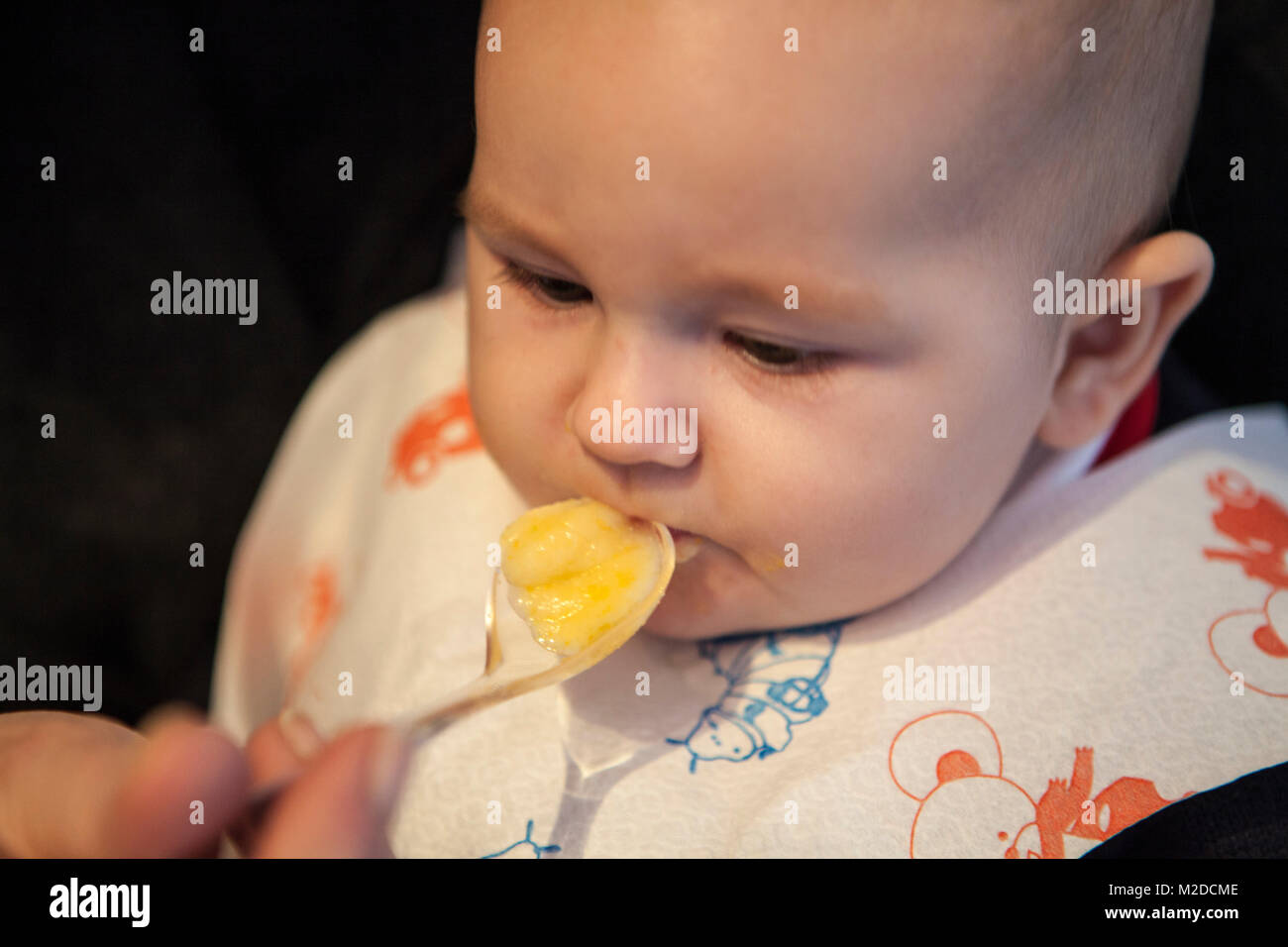 baby six months while eating pasta Stock Photo - Alamy