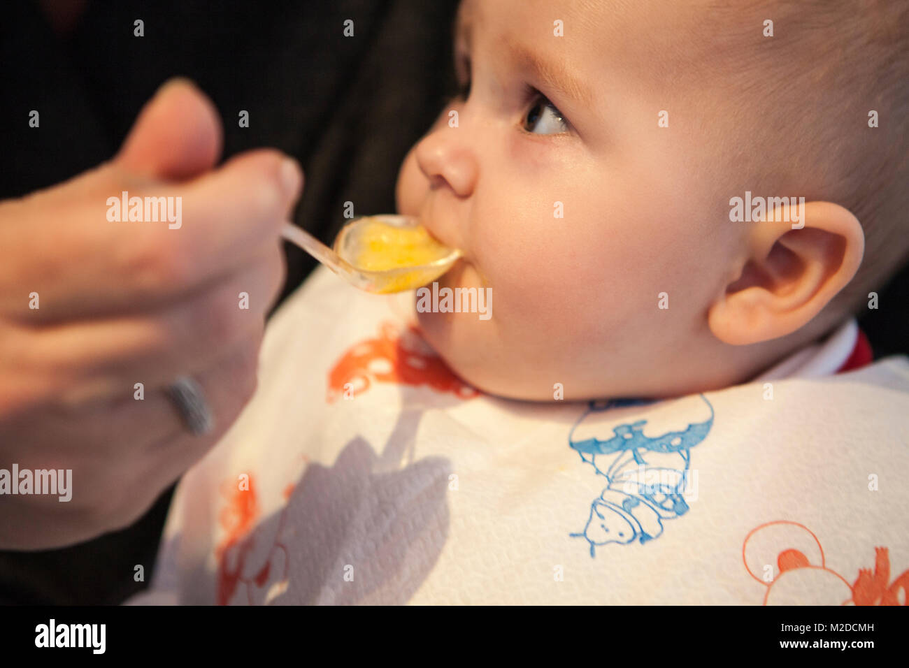 baby six months while eating pasta Stock Photo - Alamy