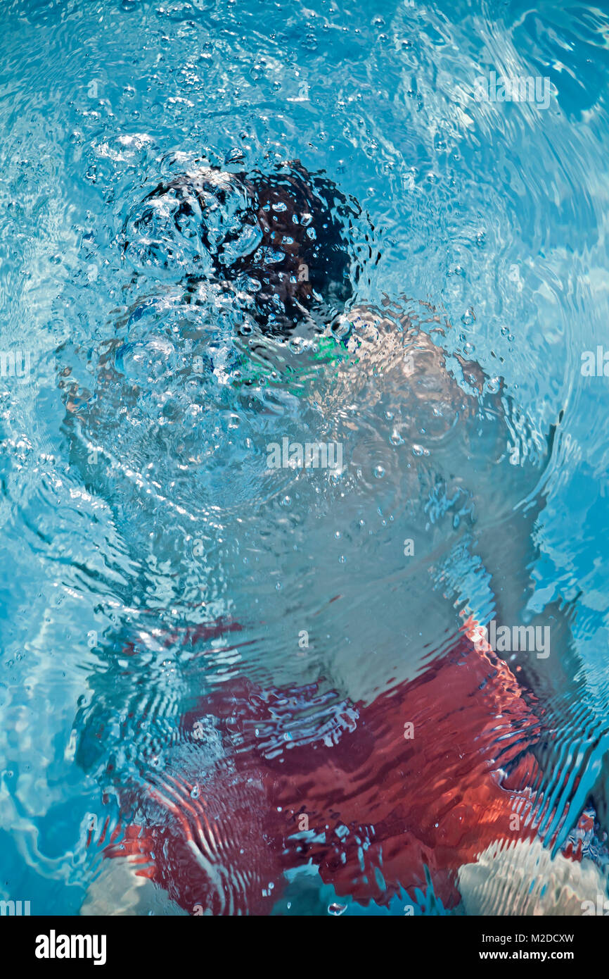 Man dives in pool hi-res stock photography and images - Alamy