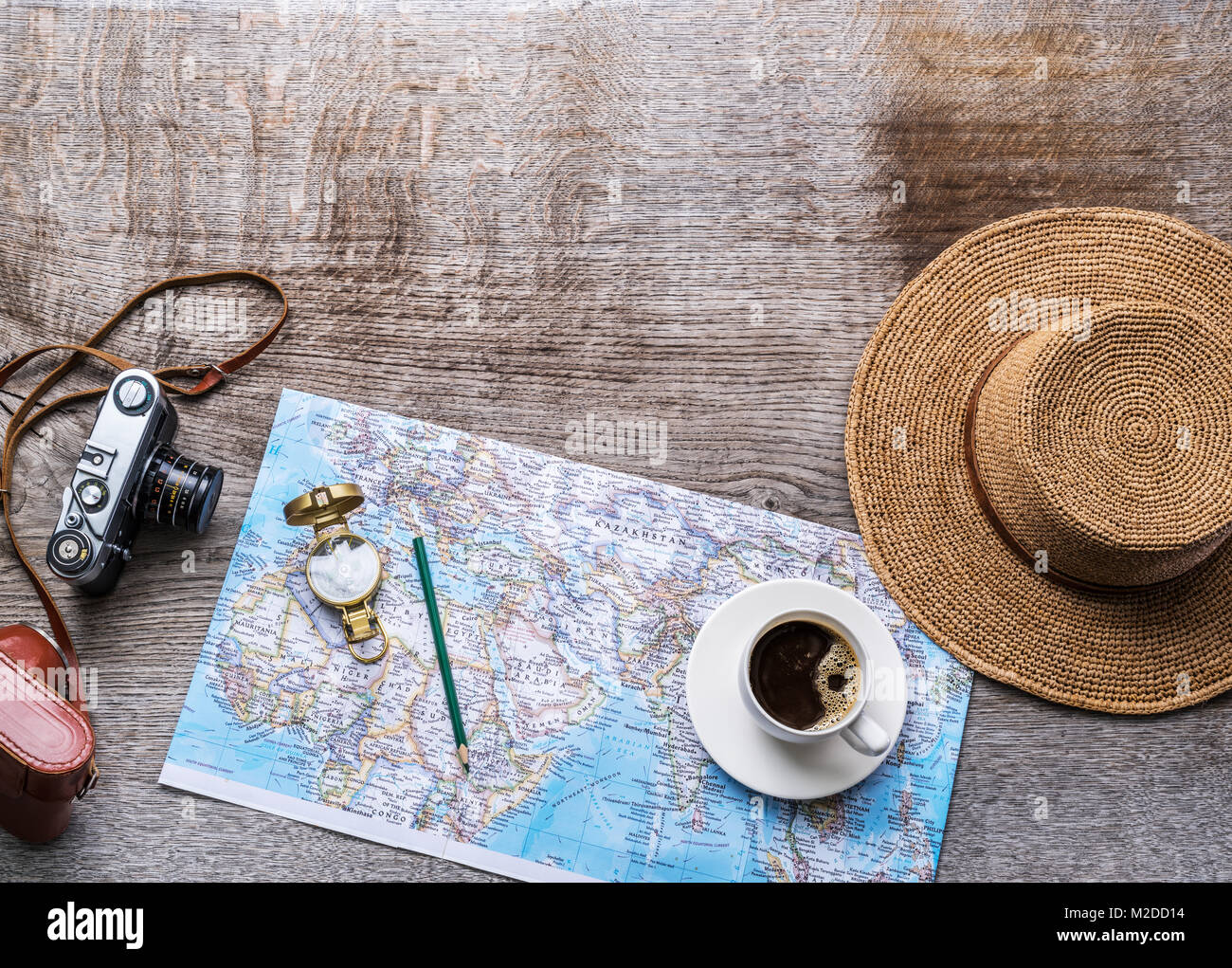 Planning new travel destinations on the world map. Top view Stock Photo ...
