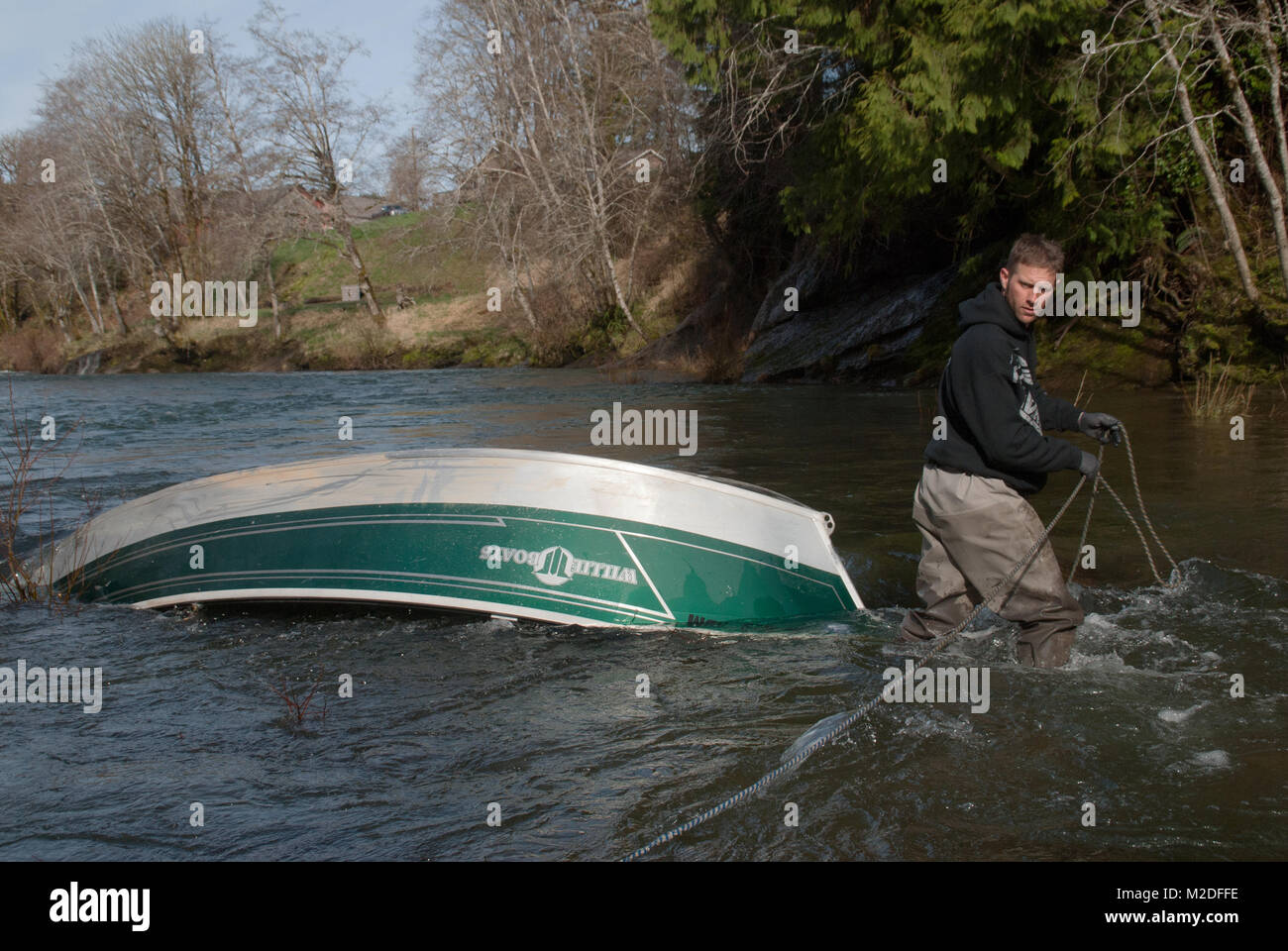 Capsized drift boat on the Siletz River, Oregonn Steelhead trout ...